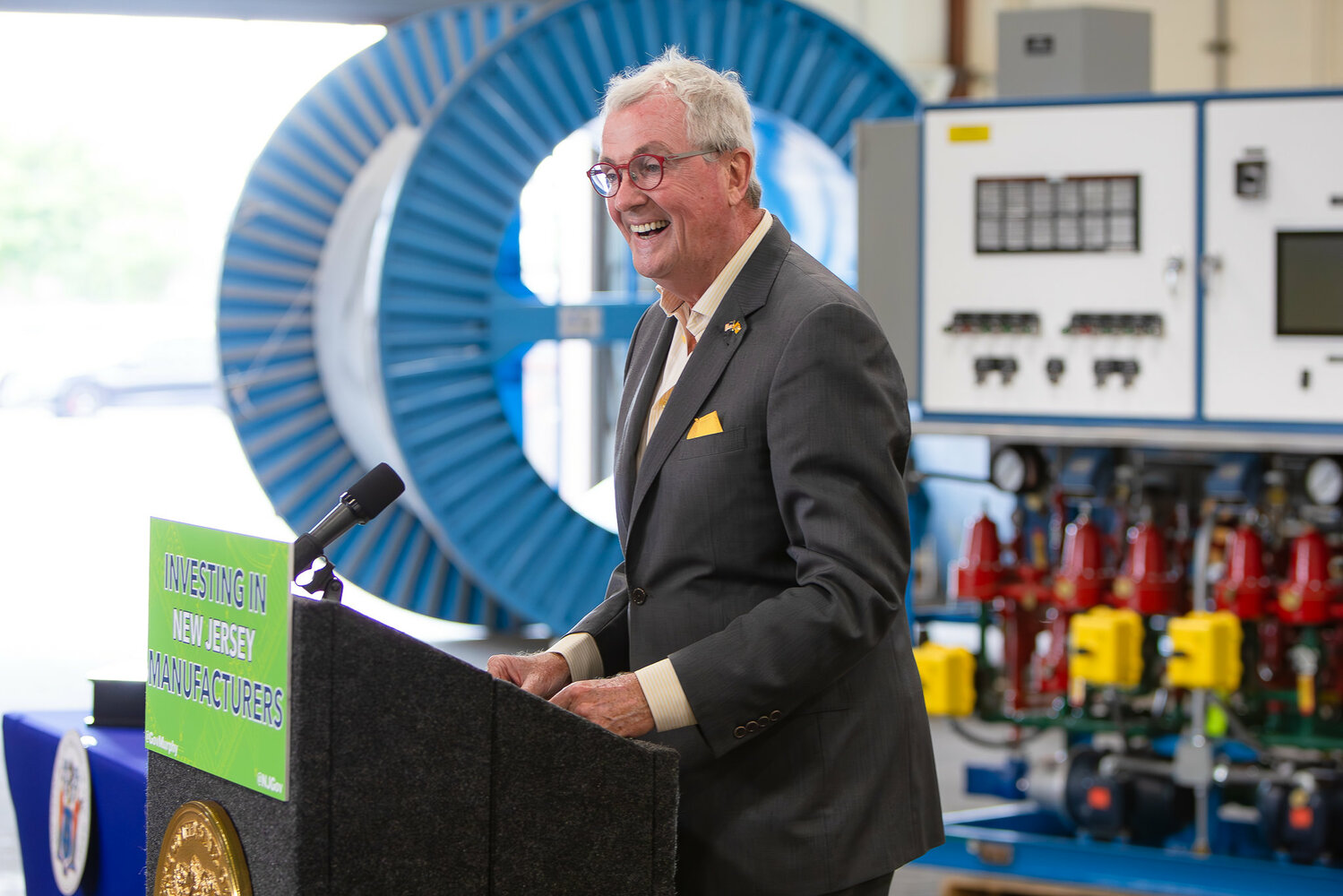 NJ governor signs $500M tax credit bill in bid to boost manufacturing ...