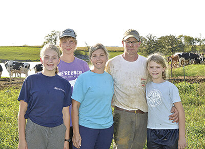 Milking cows, giving back - Dairy Star