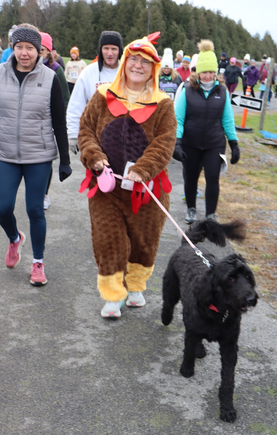 Nearly 200, some dressed in Thanksgiving attire, raise $8,500 for ...